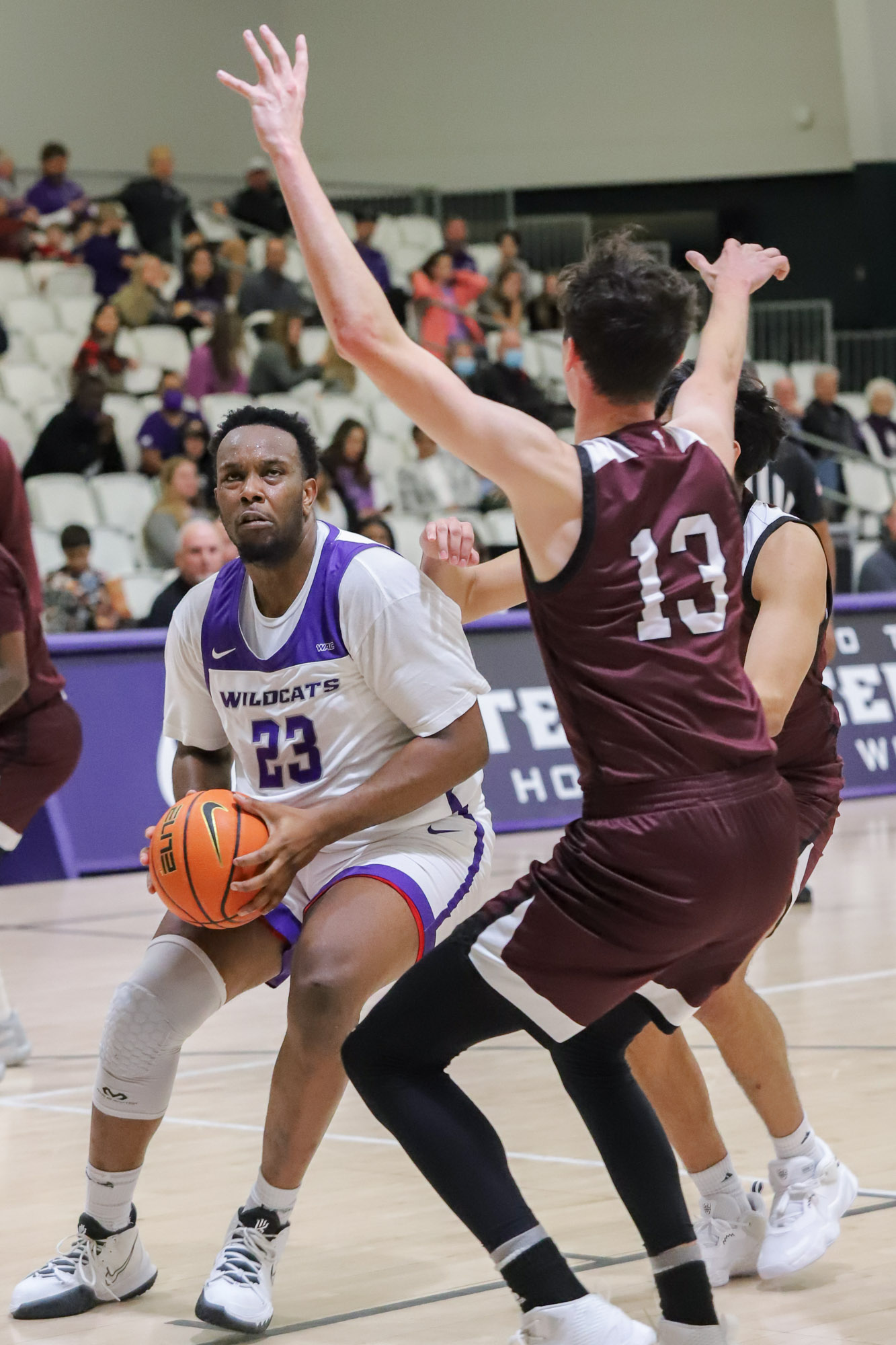 Simmons posts career-high as Wildcats overcome Wolverines in conference ...